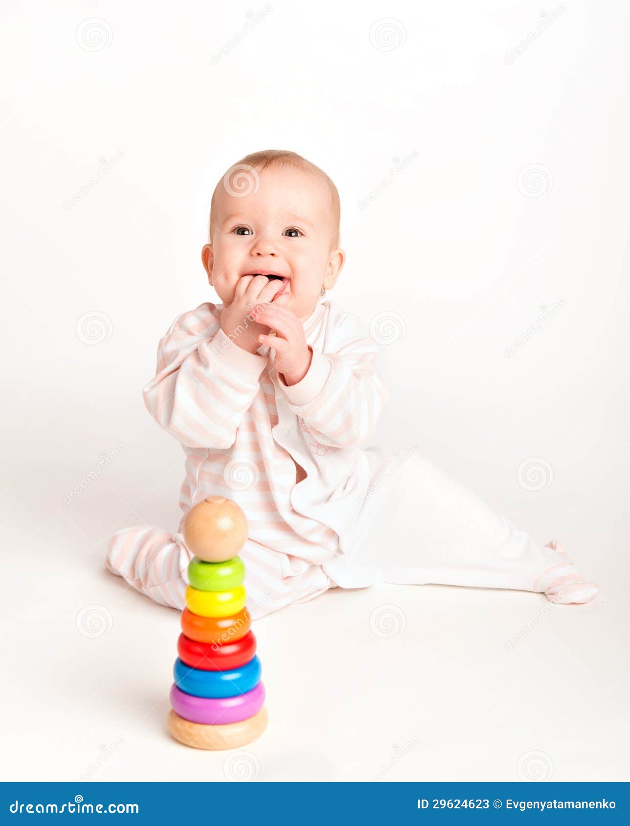 Happy Baby Playing With A Toy Pyramid Stock Image | CartoonDealer.com ...