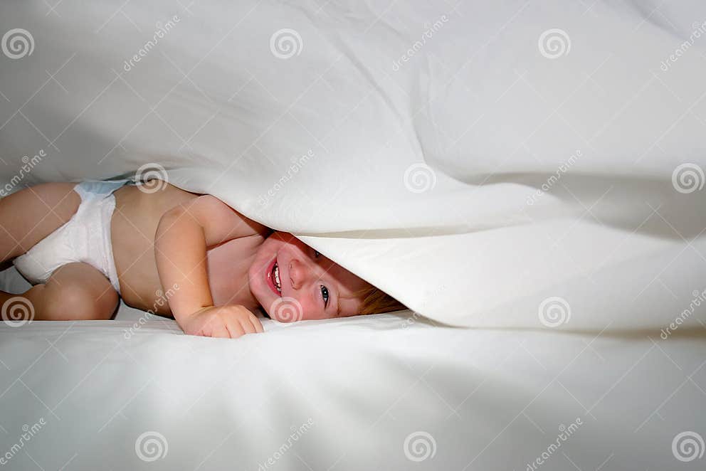 Happy Baby Playing Under Sheets on Bed Stock Image - Image of happy ...