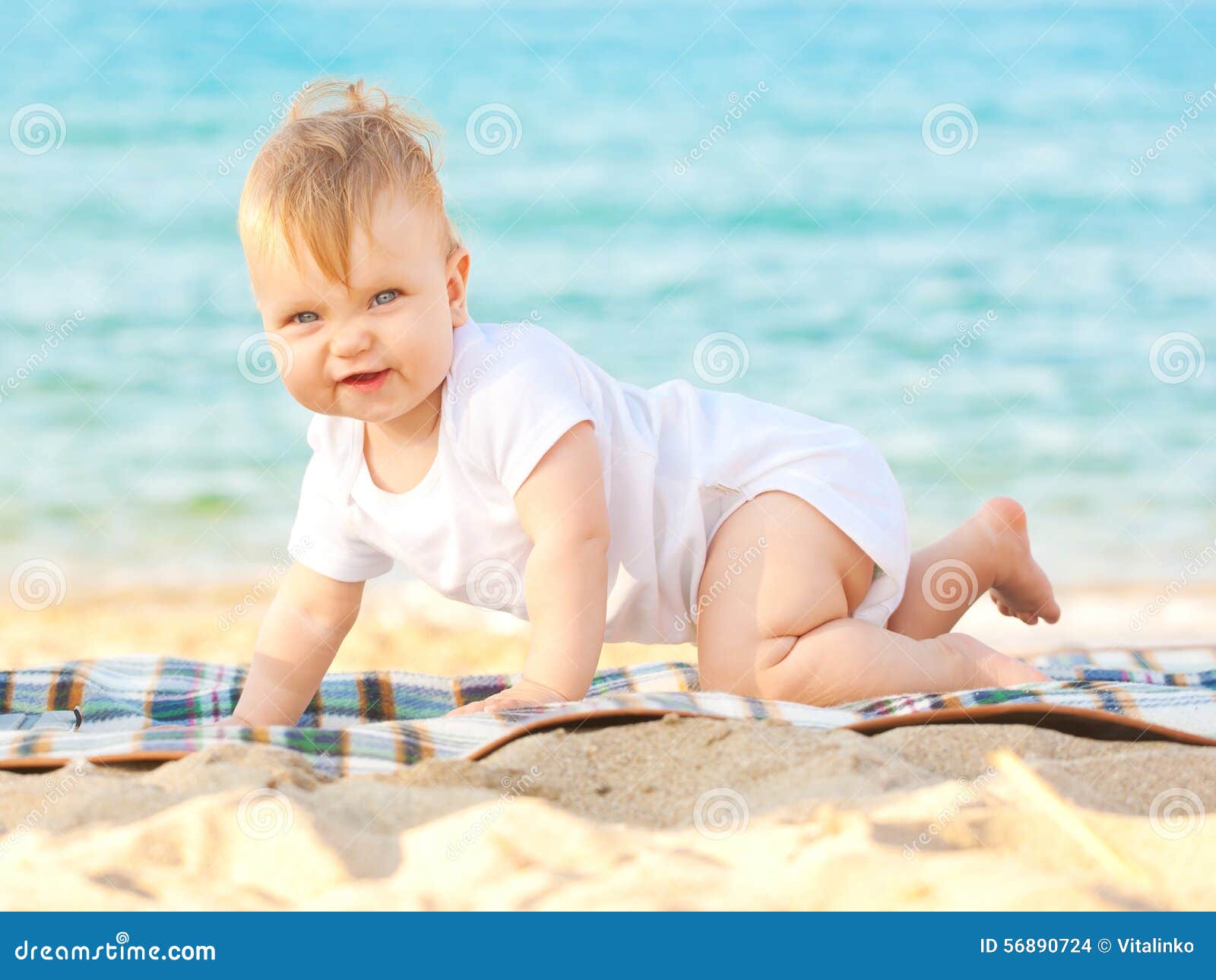 Happy Baby Relaxing at the Beach. Stock Photo - Image of seashore ...