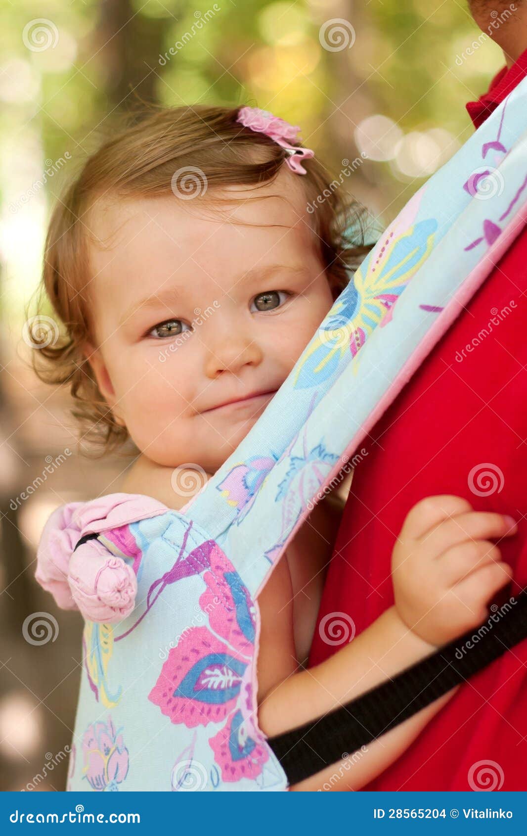 Happy Baby Sitting in a Carrying Sling. Stock Photo - Image of happy ...