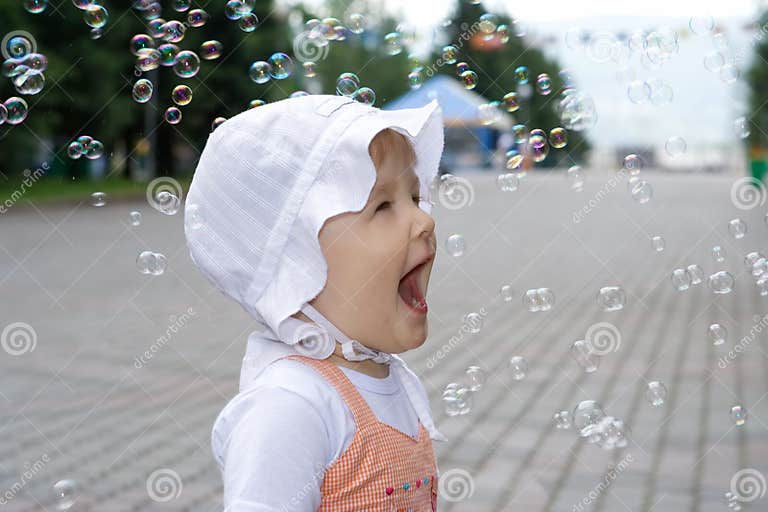 Happy Baby with Soap Bubbles Stock Photo - Image of bubbles, little ...