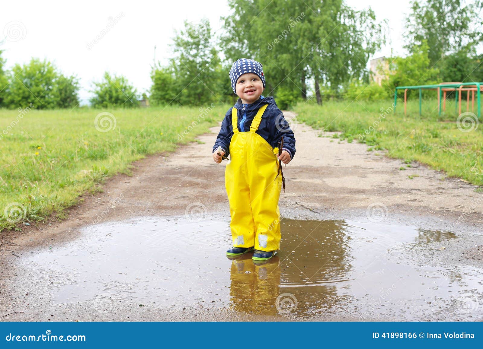 Happy Baby Standing in Puddle Stock Photo - Image of outside, lovely ...