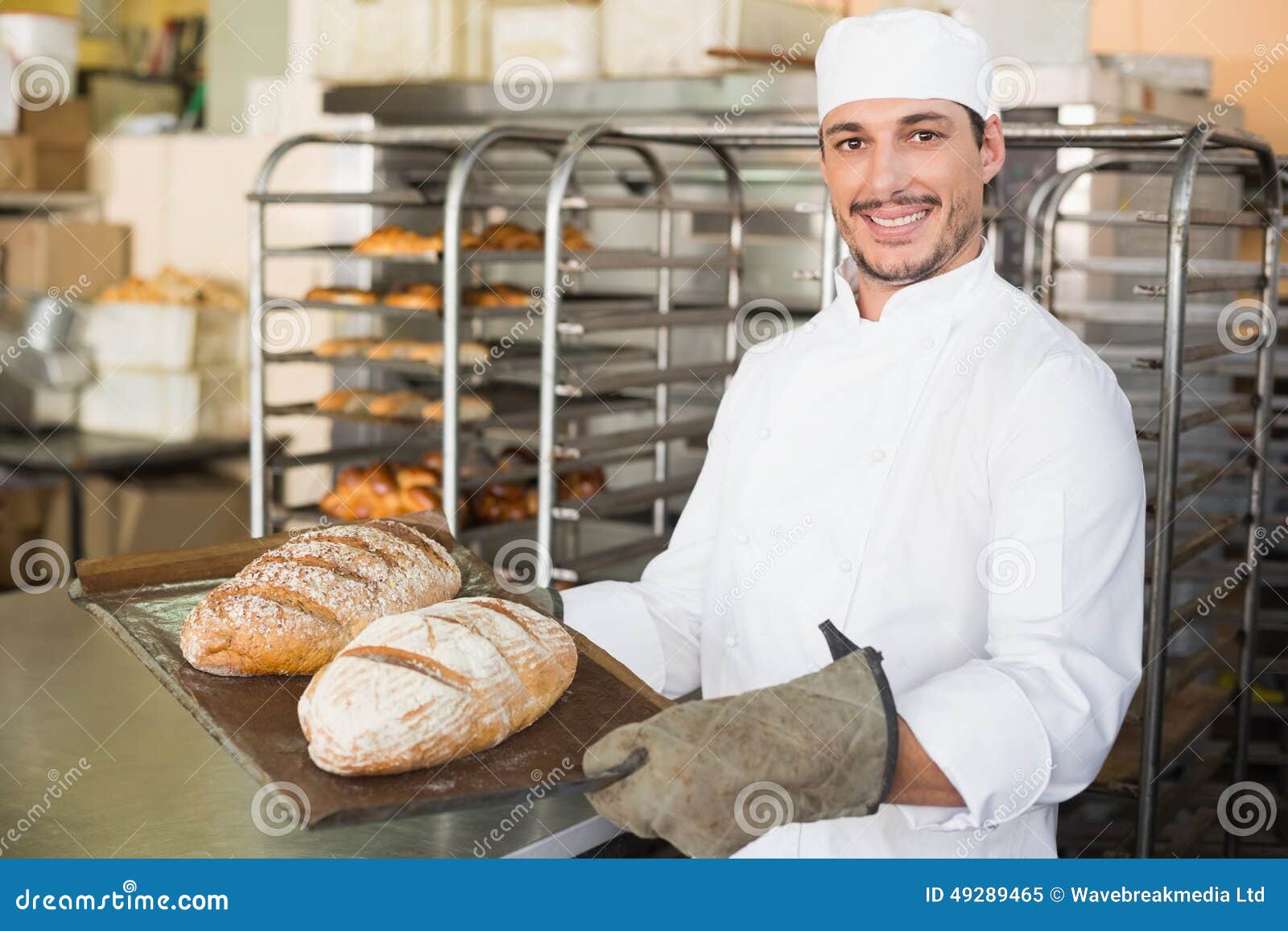 Happy Baker Showing Tray Of Fresh Bread Stock Photography ...