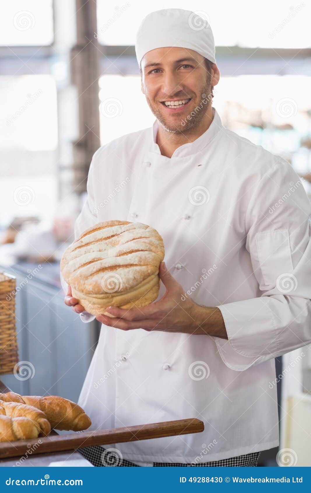 Happy Baker with Loaf of Bread Stock Photo - Image of restaurant, chefs ...