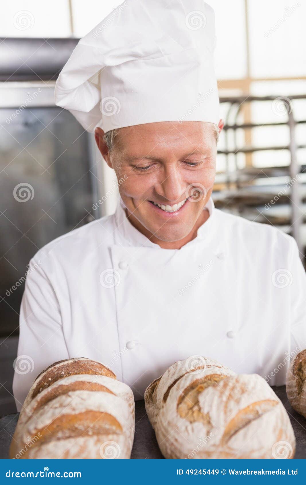 Happy Baker Showing Tray of Fresh Bread Stock Image - Image of ...