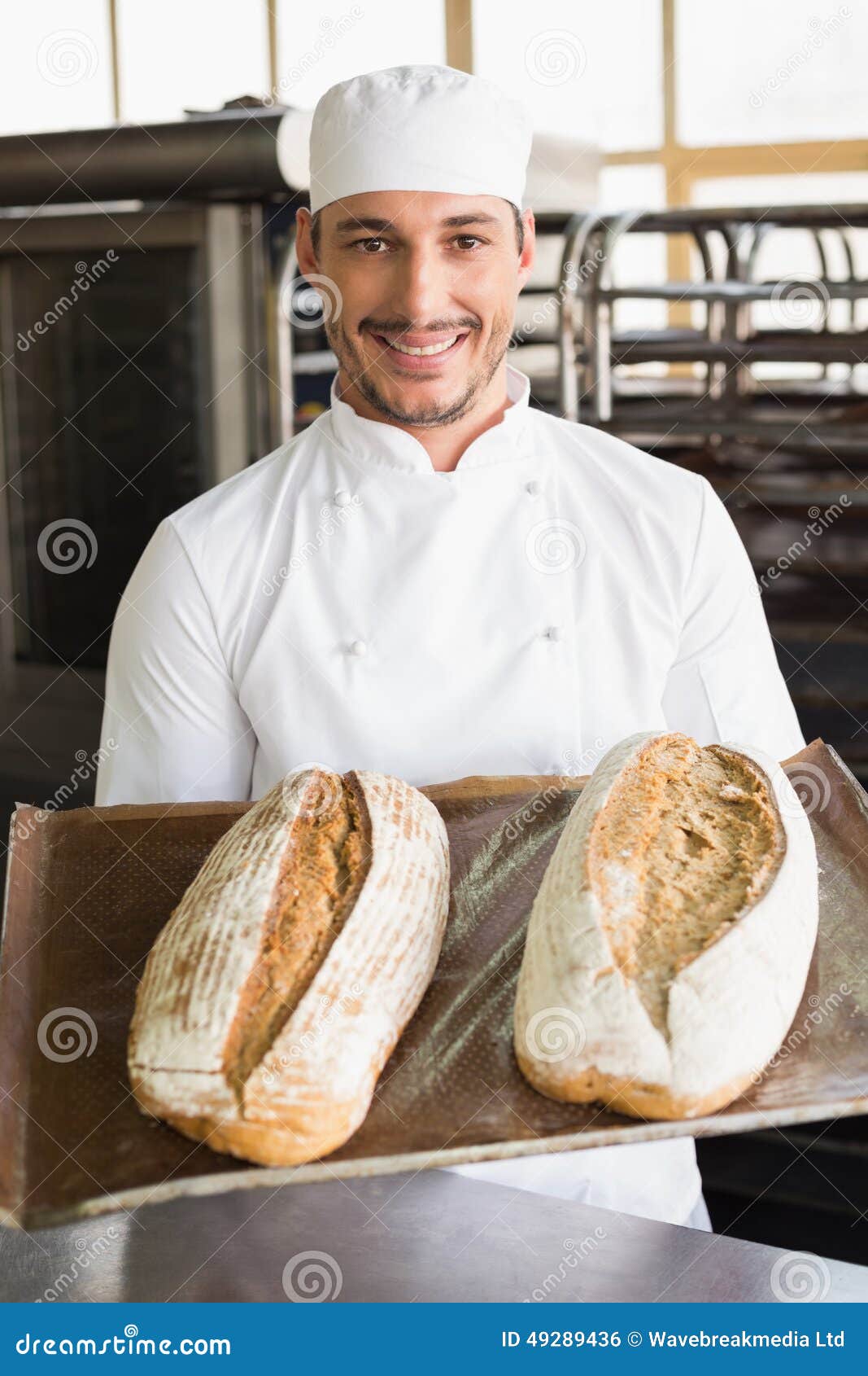 Happy Baker Showing Tray of Fresh Bread Stock Photo - Image of chef ...