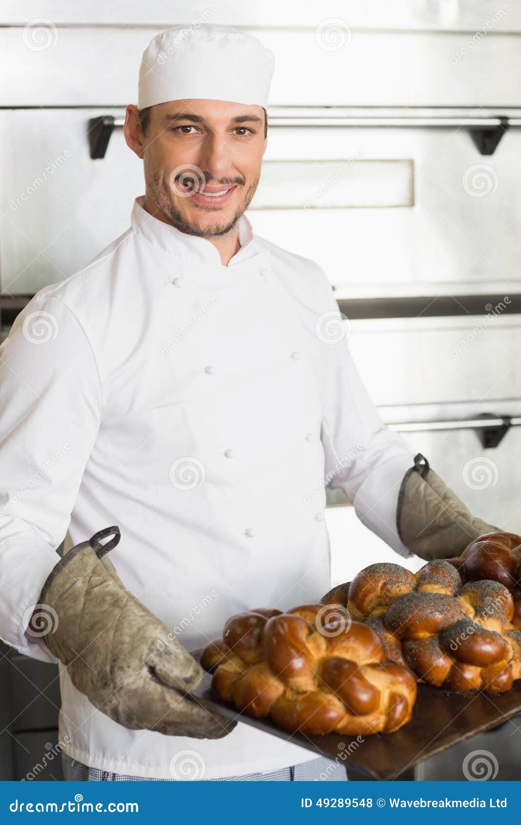 Happy Baker Showing Tray of Fresh Bread Stock Photo - Image of business ...