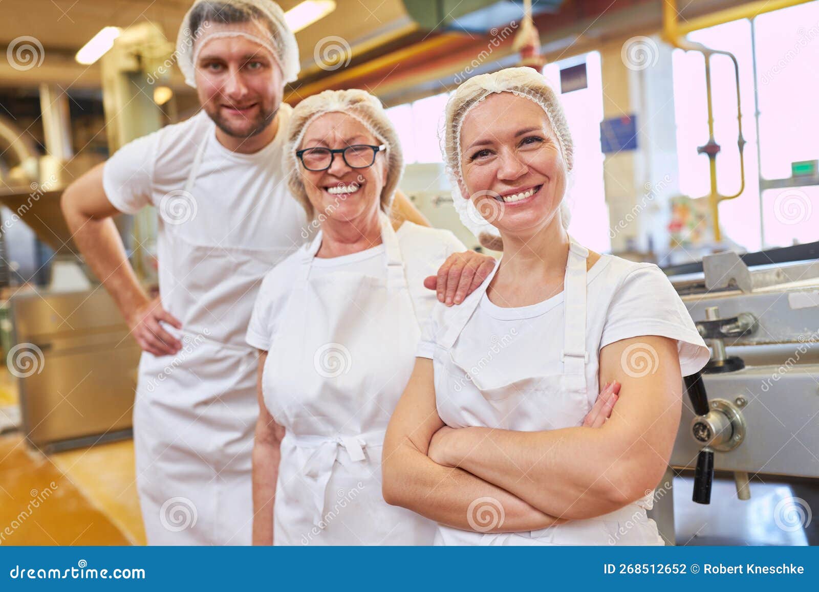 Happy Baker Team with Apprentices in Training Stock Photo - Image of ...