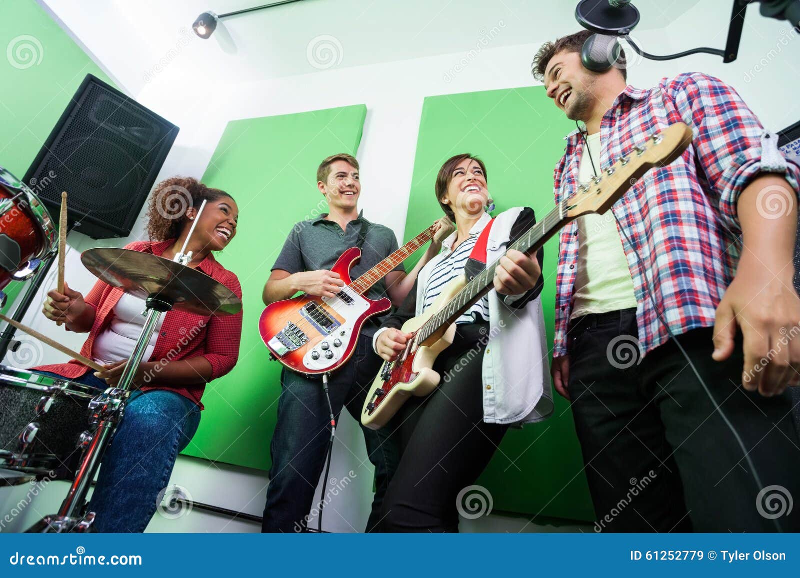 Happy Band Members Performing in Recording Studio Stock Image - Image ...