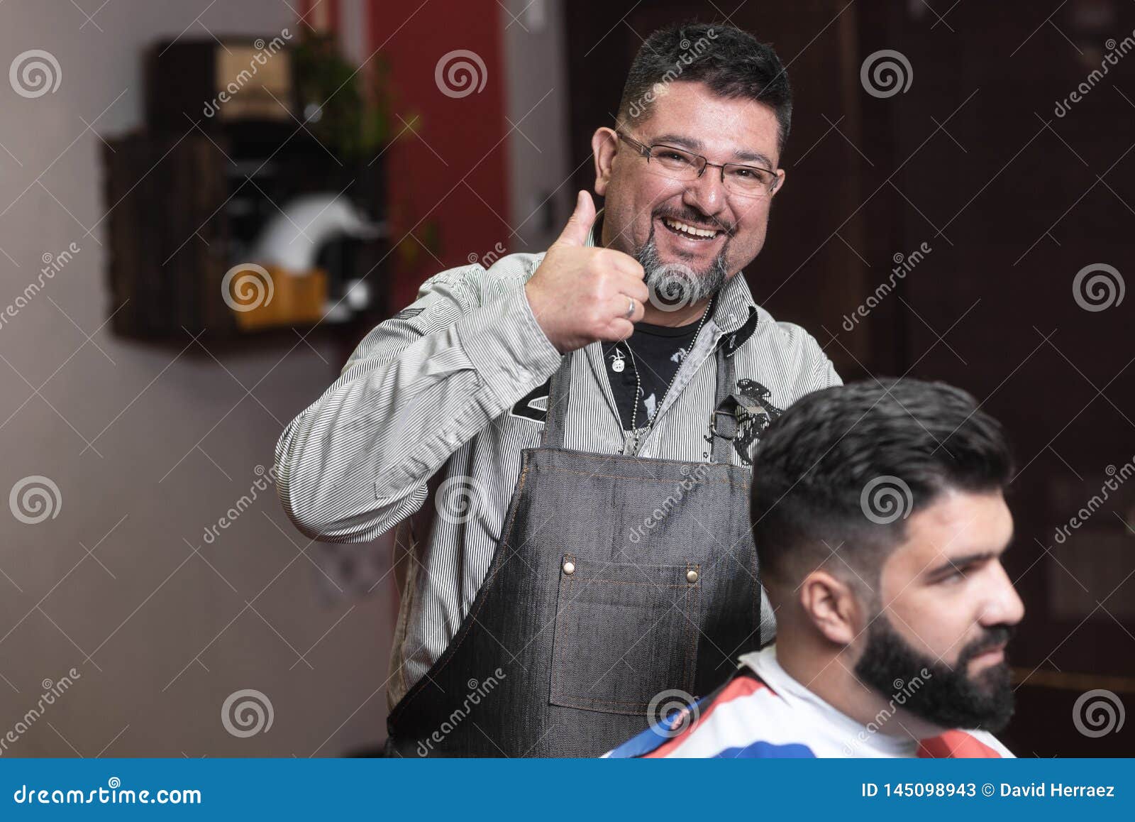 Happy Barber Customer Satisfied with the Result. Barber Smiling Showing ... Happy Barber Customer Satisfied with the Result. Barber Smiling Showing ...