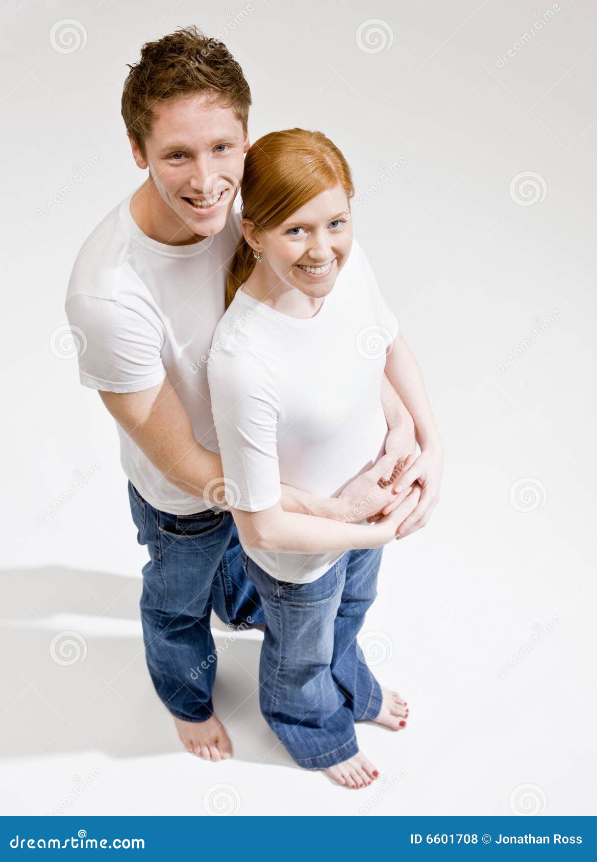 Happy Barefoot Couple Hugging Stock Photo - Image of glad, smiling: 6601708
