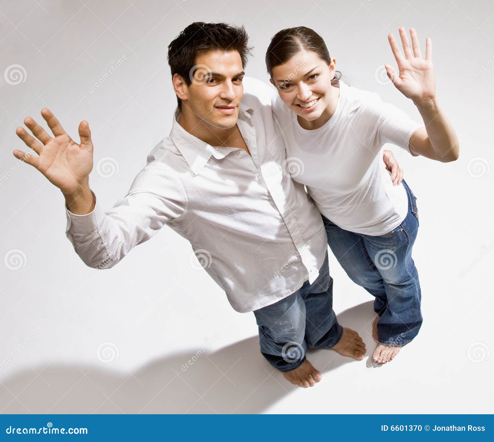 Happy Barefoot Couple Waving Stock Photo - Image of glad, female: 6601370