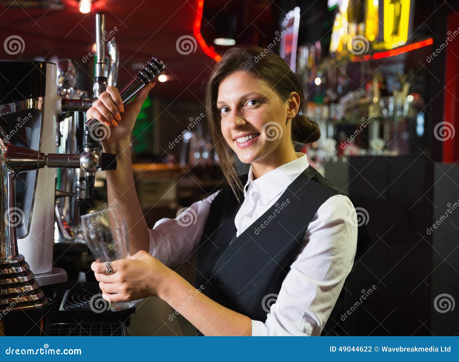Happy Barmaid Pulling a Pint of Beer Stock Photo - Image of view, beer ...
