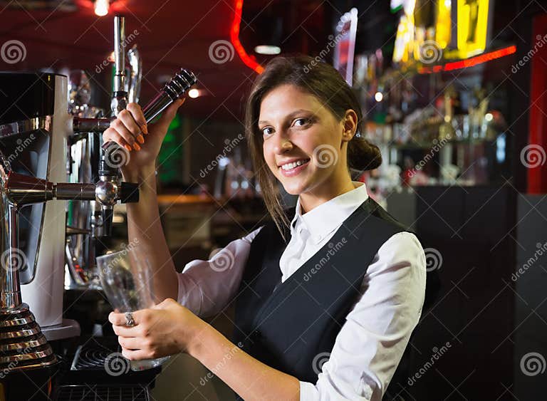 Happy Barmaid Pulling a Pint of Beer Stock Photo - Image of view, beer ...