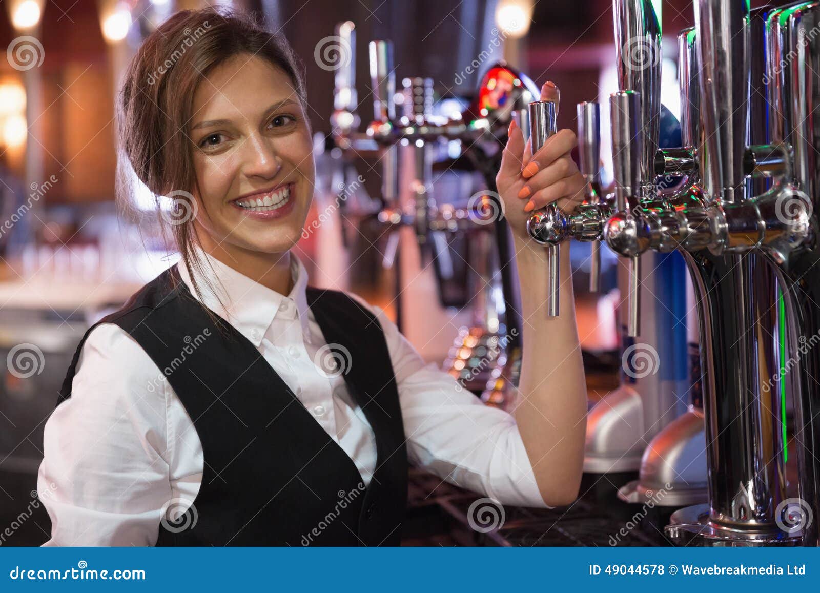 Happy Barmaid Smiling at Camera Stock Photo - Image of alcoholic ...