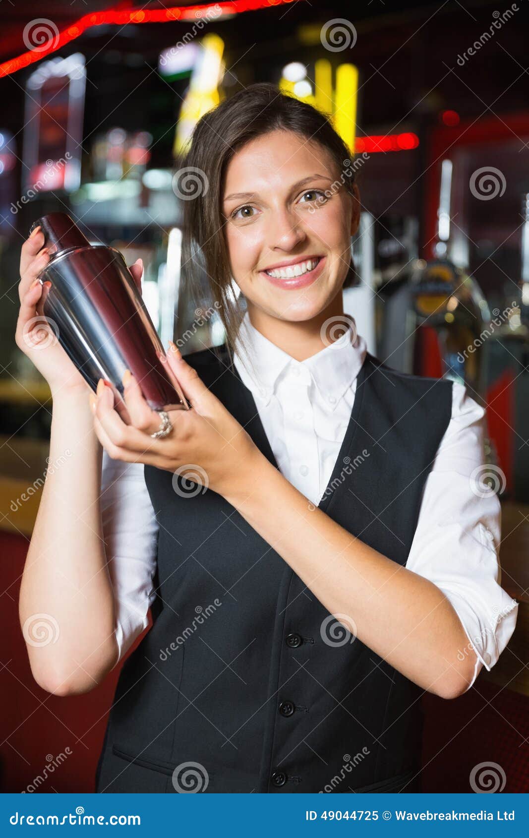 Happy Barmaid Smiling At Camera Making Cocktail Royalty-Free Stock ...