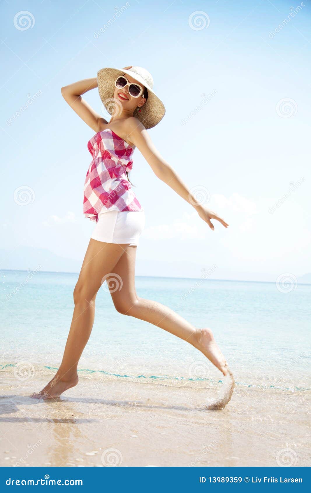 Happy on the beach stock image. Image of woman, skies - 13989359