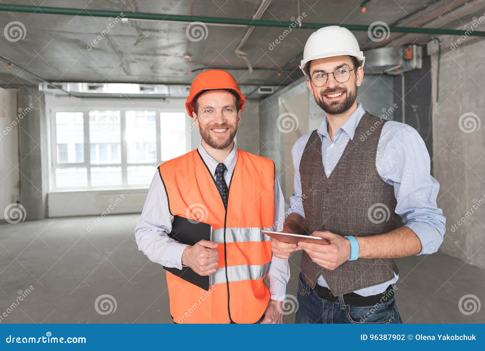 Happy Bearded Builder Having Job with Foreman Stock Photo - Image of ...