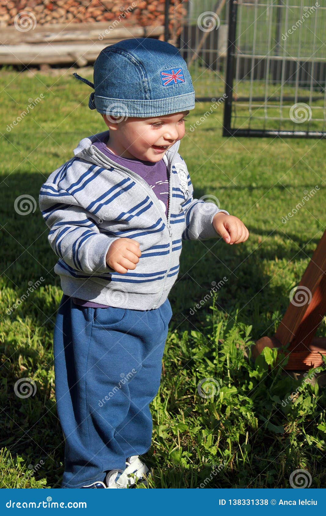 Happy Beautiful Baby Boy Making First Steps. Stock Photo - Image of ...