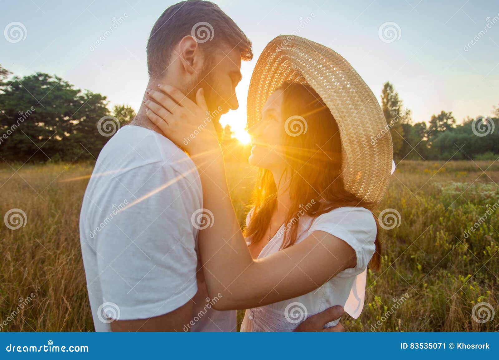 Happy Beautiful Couple Hugs in Park in the on the Sunset. Stock Image ...