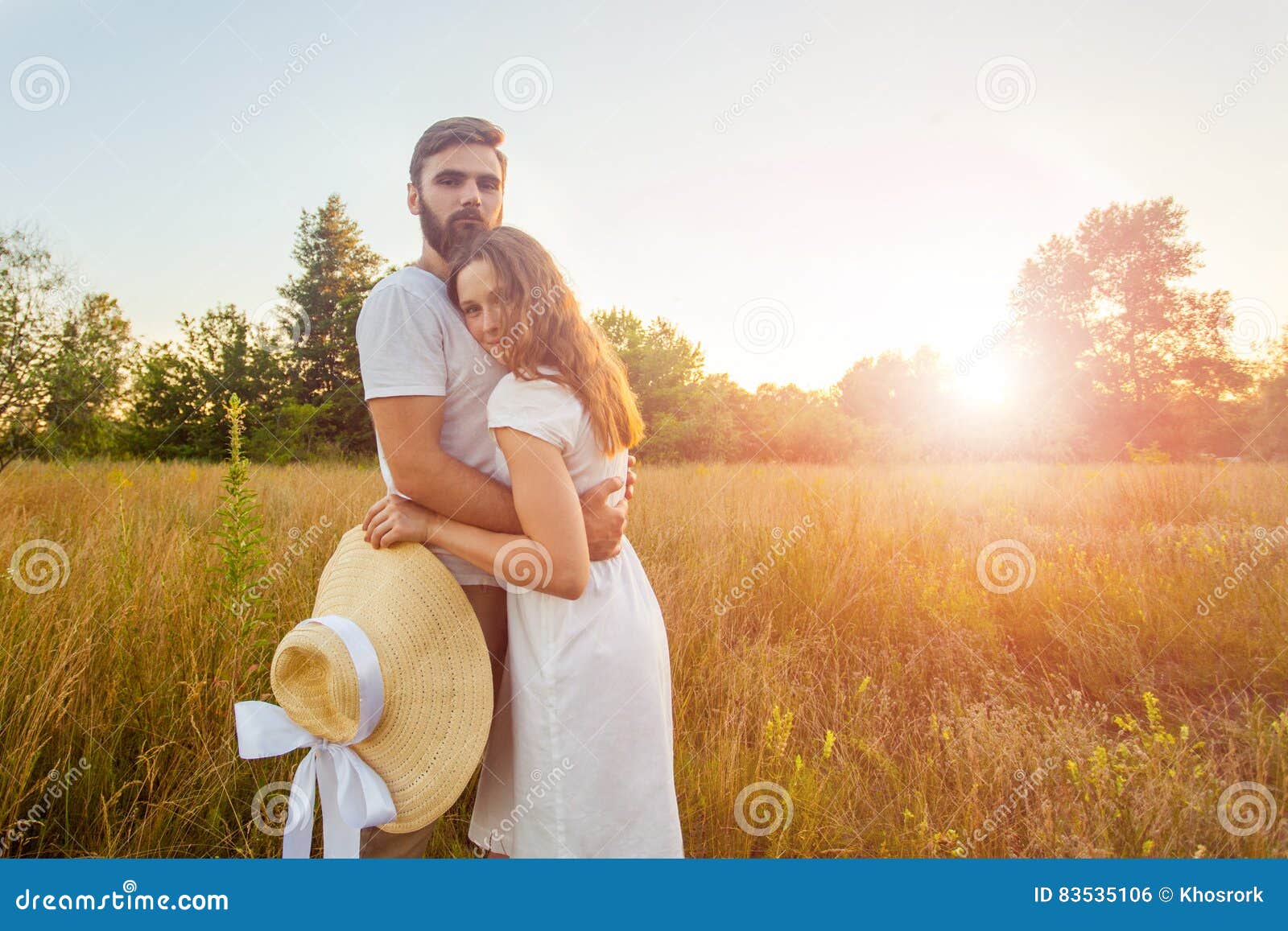 Happy Beautiful Couple Hugs in Park in the on the Sunset. Stock Photo ...