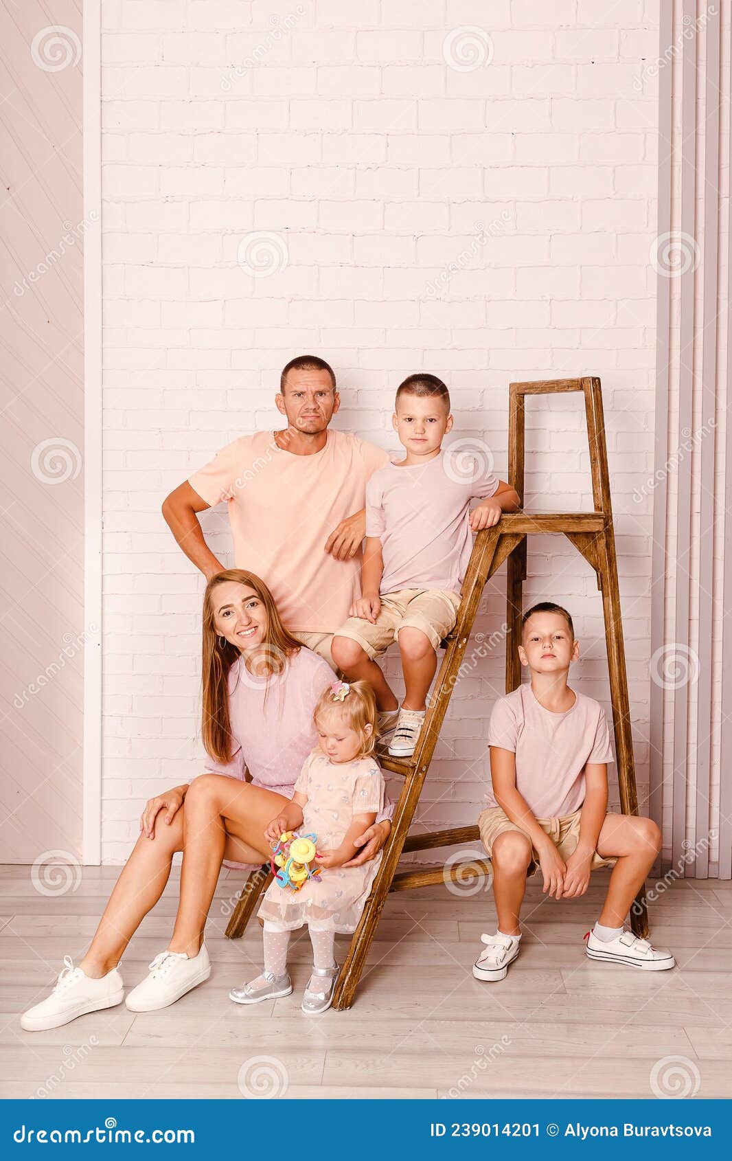 Happy Beautiful Family of Five in Light Pink Clothes Stock Image ...
