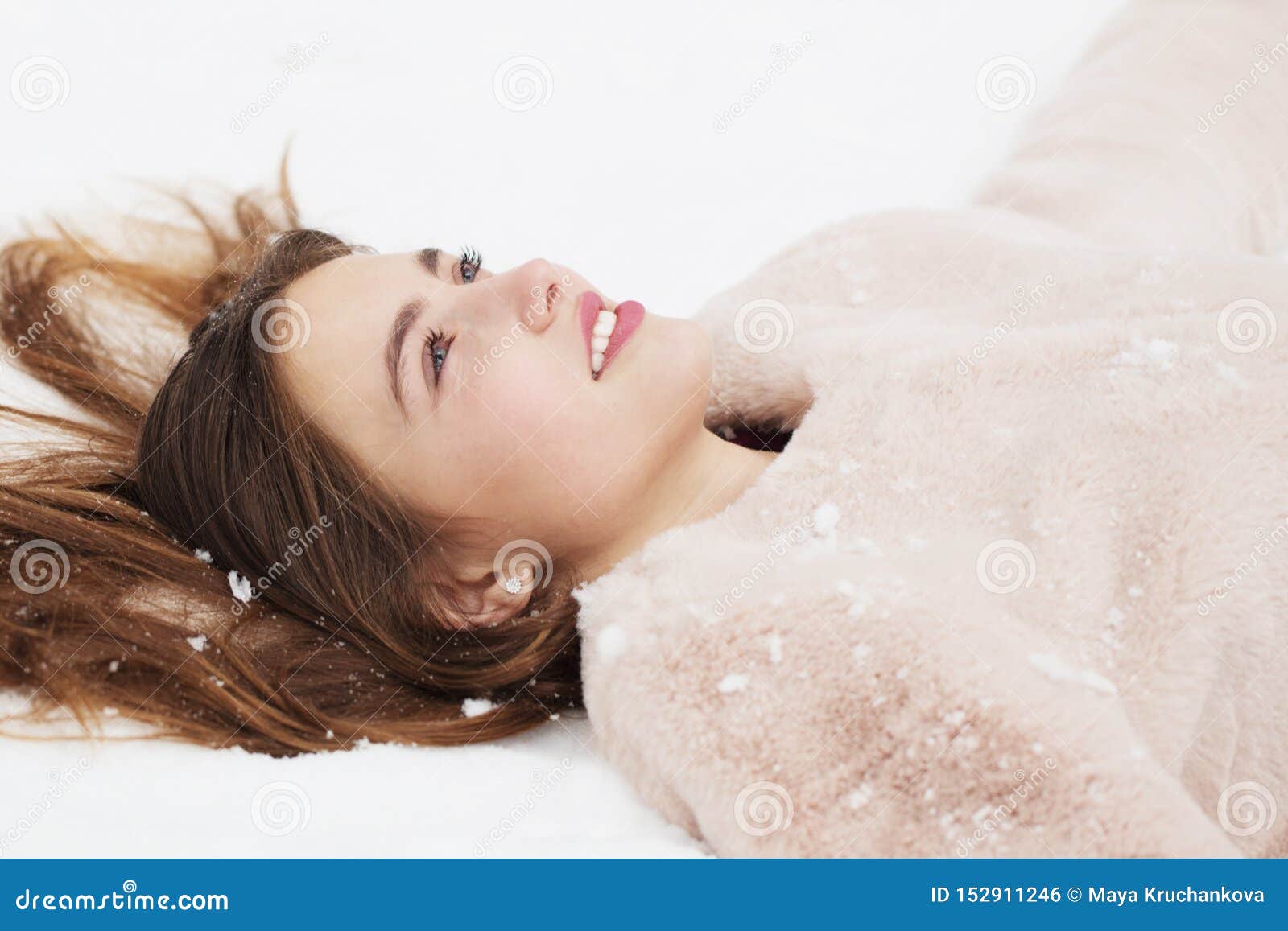 Beautiful girl on snow stock photo. Image of female - 152911246