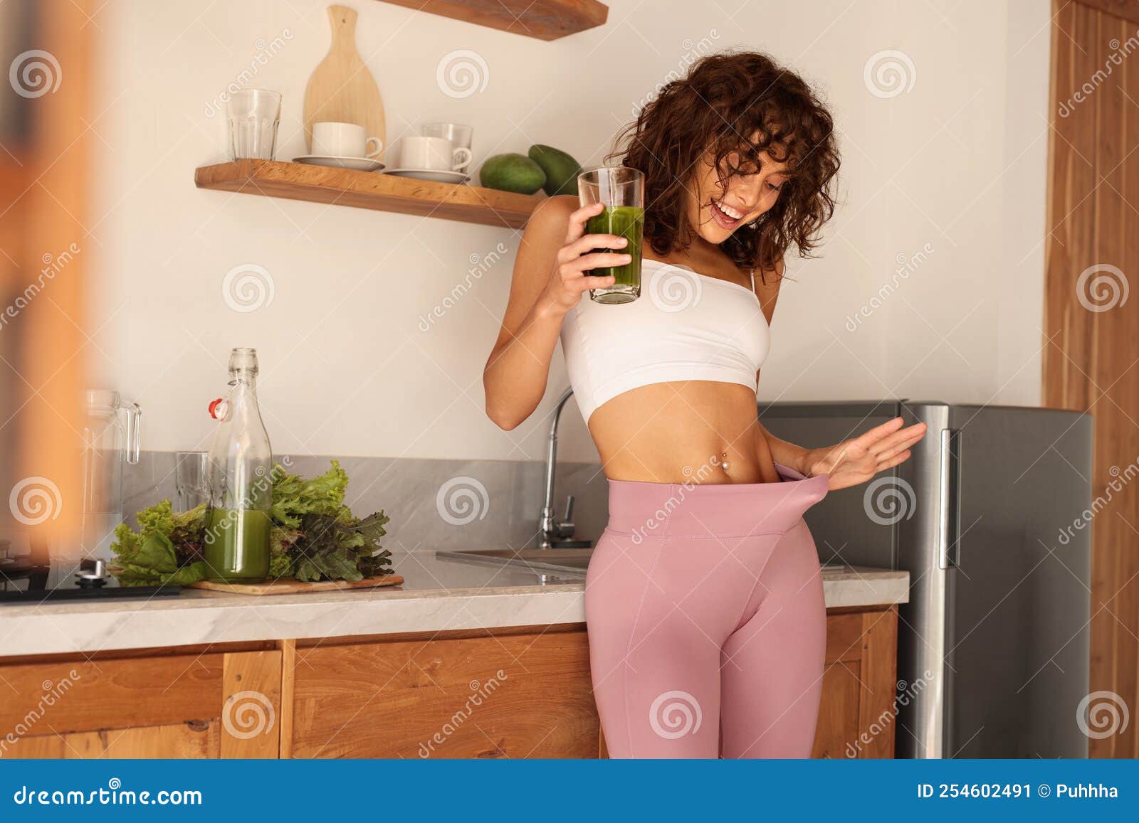 Happy Beautiful Smiling Woman Drinking Detox Smoothie And Rejoicing Of