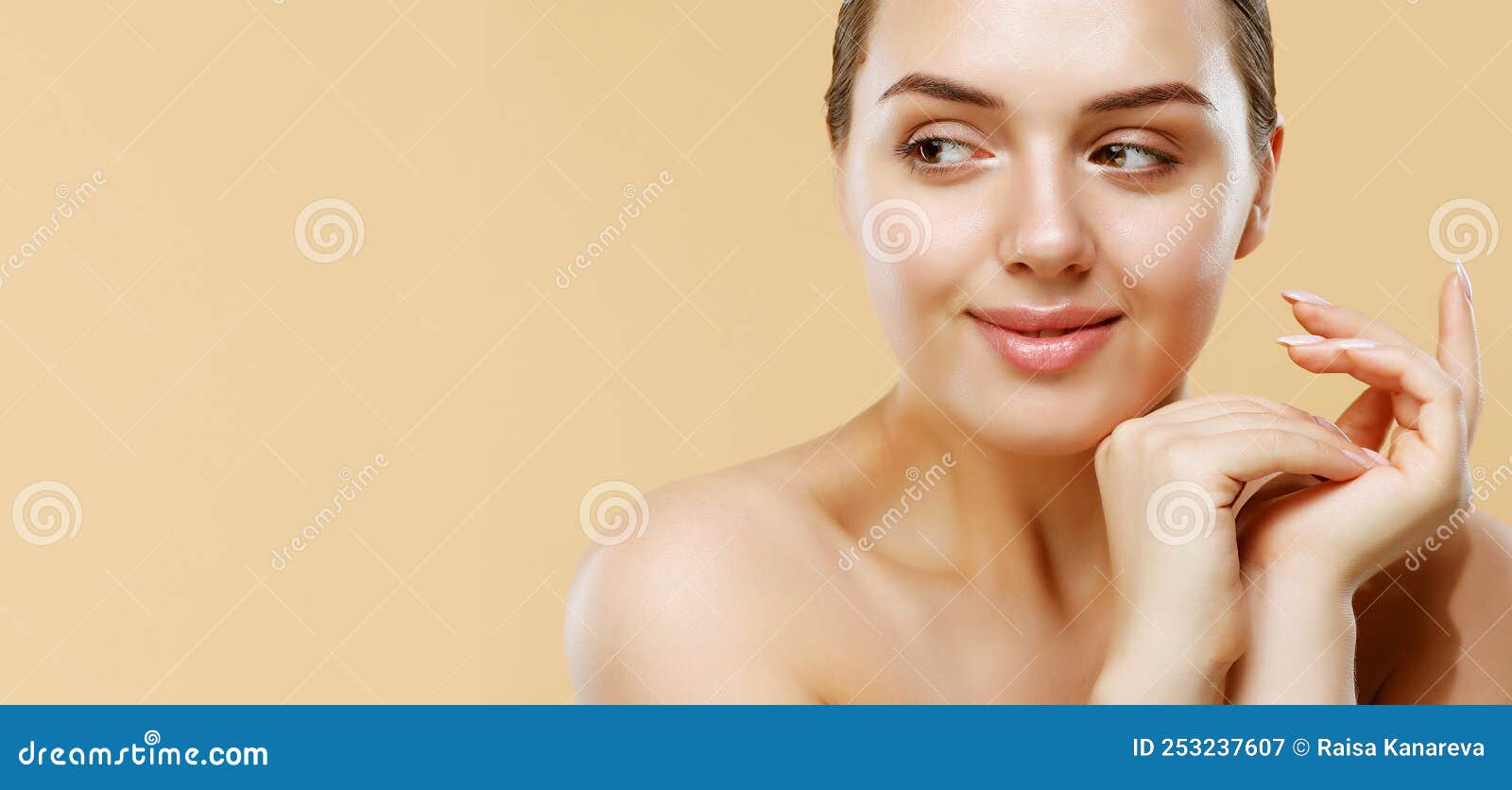 Happy Beautiful Woman Holding Her Cheeks A Laugh Looking To The Side
