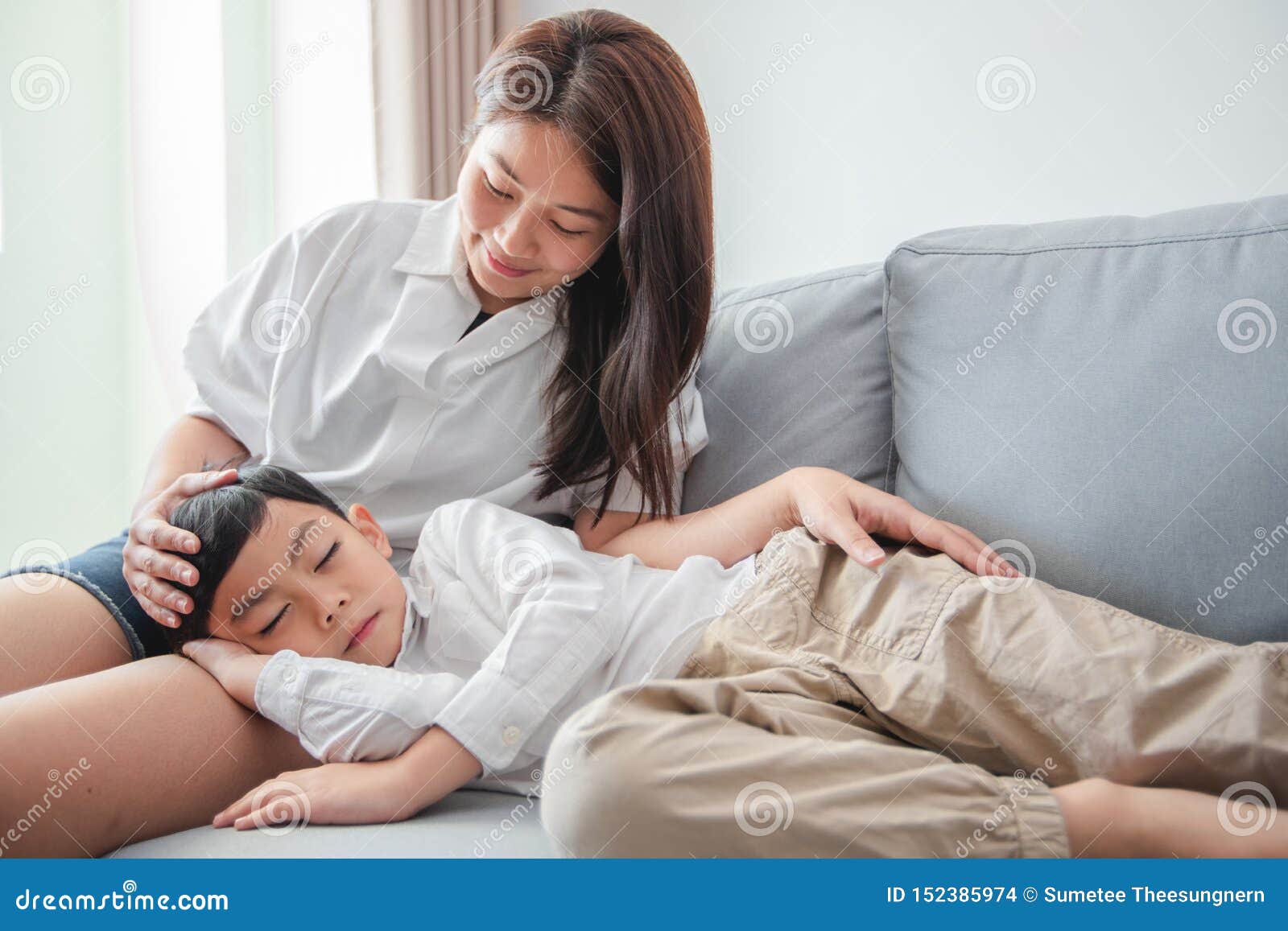 Happy Bedtime Child Sleeping on Sofa with Mom Stock Photo - Image of ...