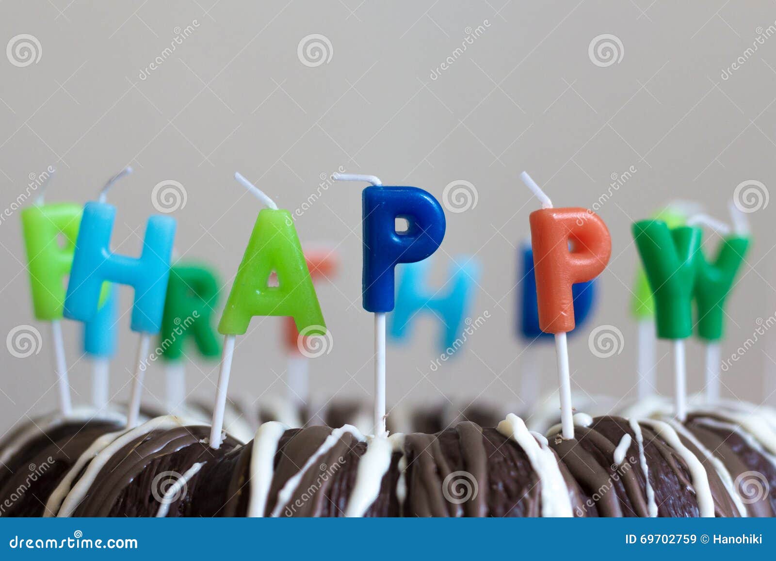 Happy Birthday Candles on Chocolate Cake Stock Image - Image of blue ...