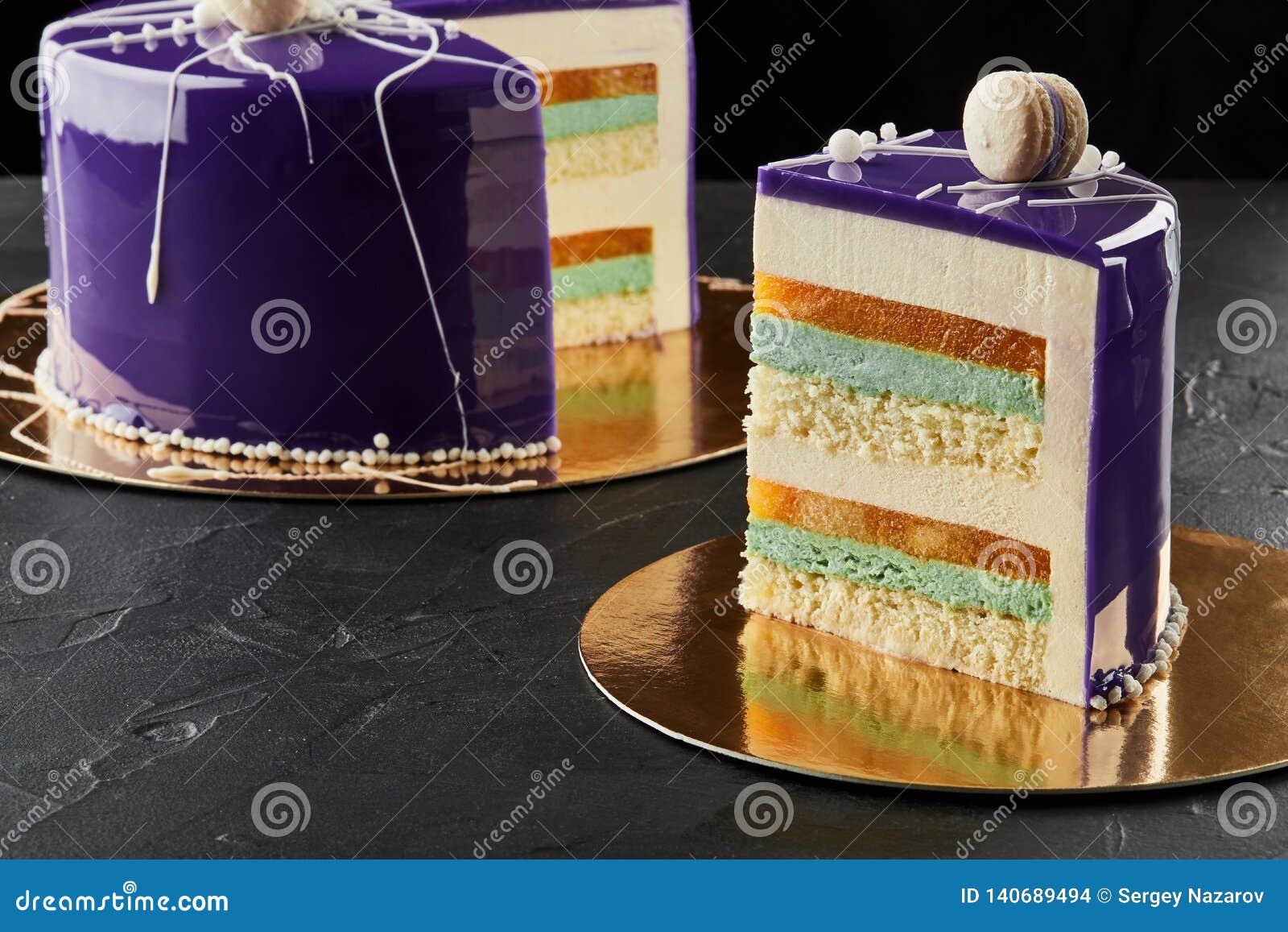 Happy Birthday Multi Layer Cake. with Purple Icing and Macaroons Stock ...