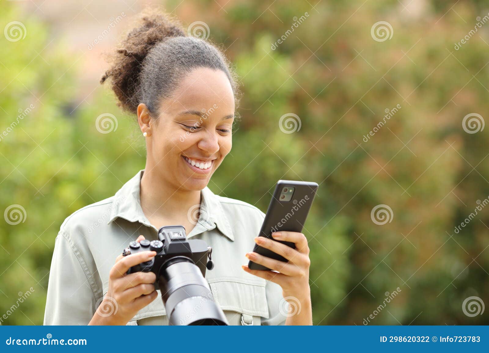 Happy Black Photographer Checking Phone Content Stock Photo - Image of ...