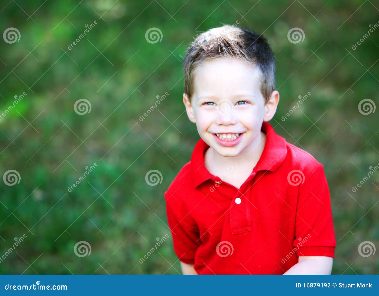 Happy boy stock photo. Image of handsome, green, grass - 16879192