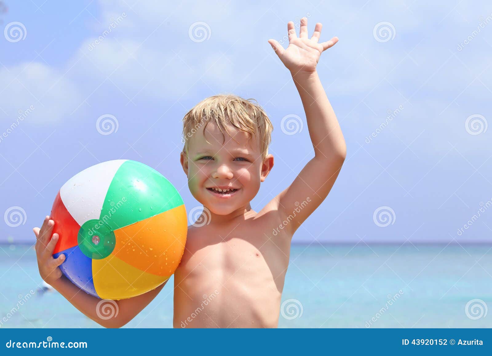 Happy boy with beach ball stock photo. Image of caucasian - 43920152