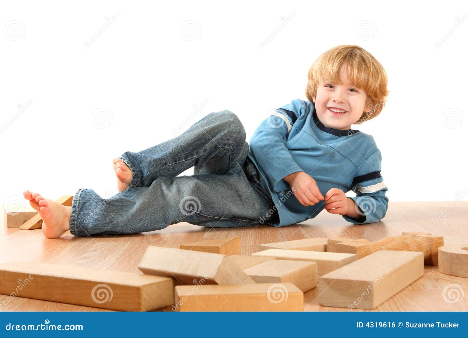 Happy Boy with blocks stock photo. Image of laying, smiling - 4319616
