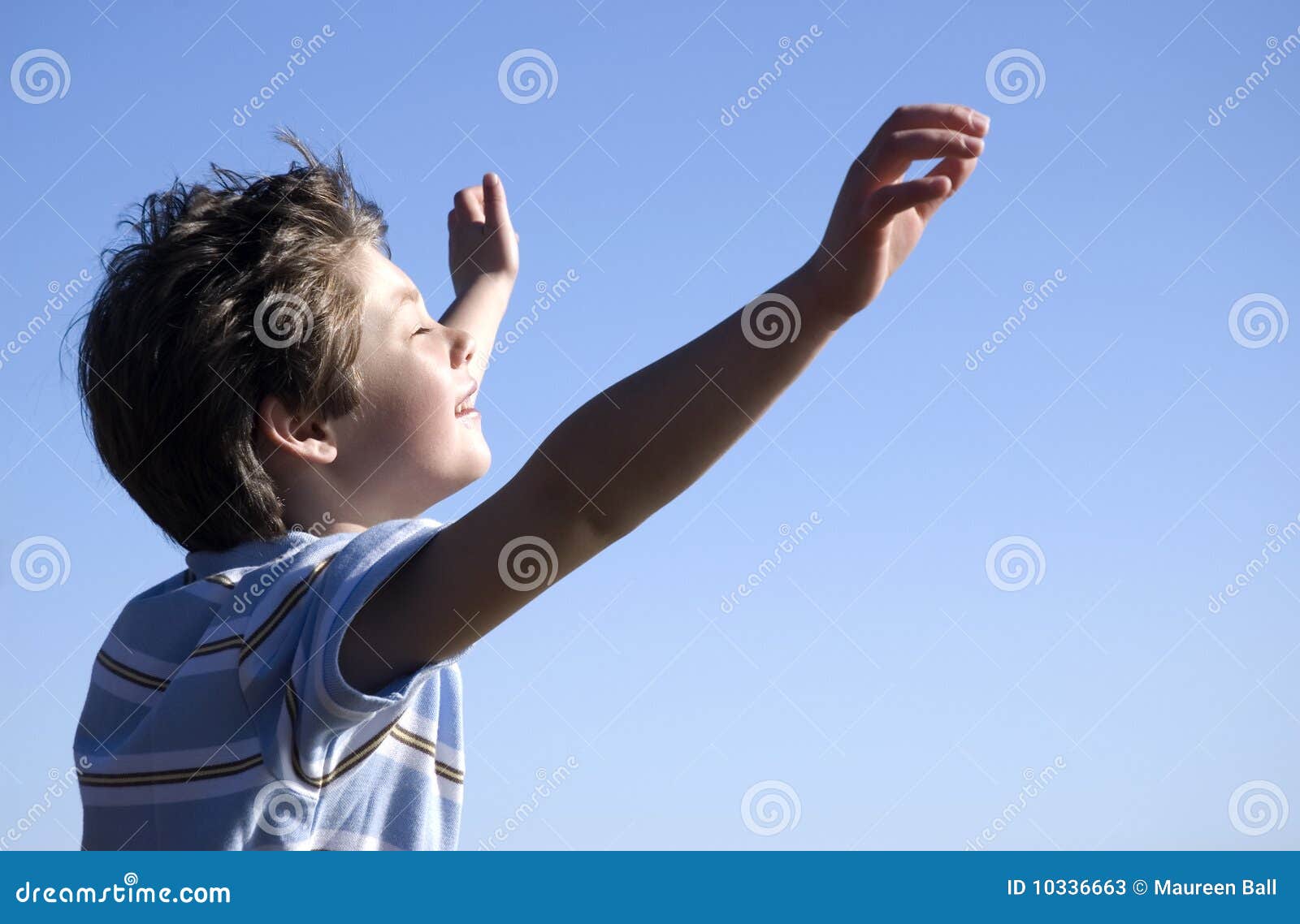 Happy boy and blue sky stock image. Image of side, joyful - 10336663