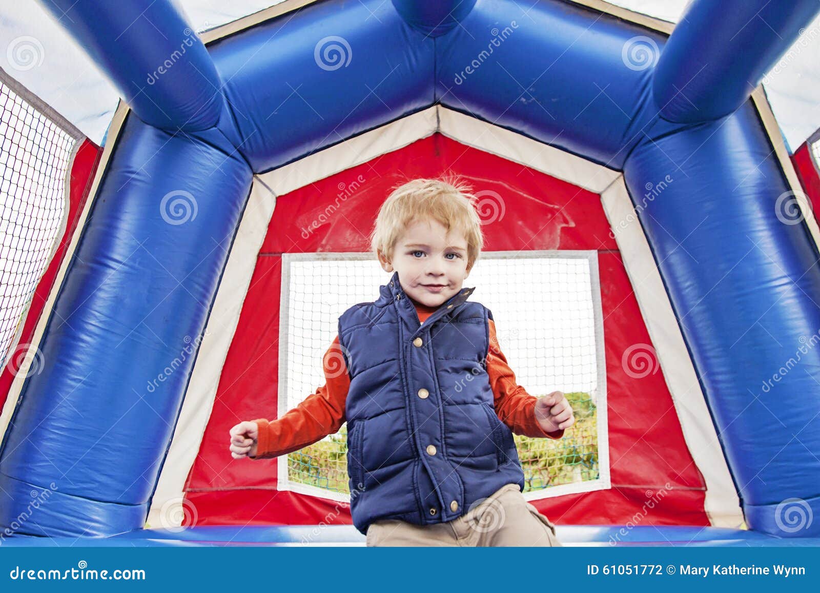Happy boy in bounce house stock photo. Image of birthday - 61051772