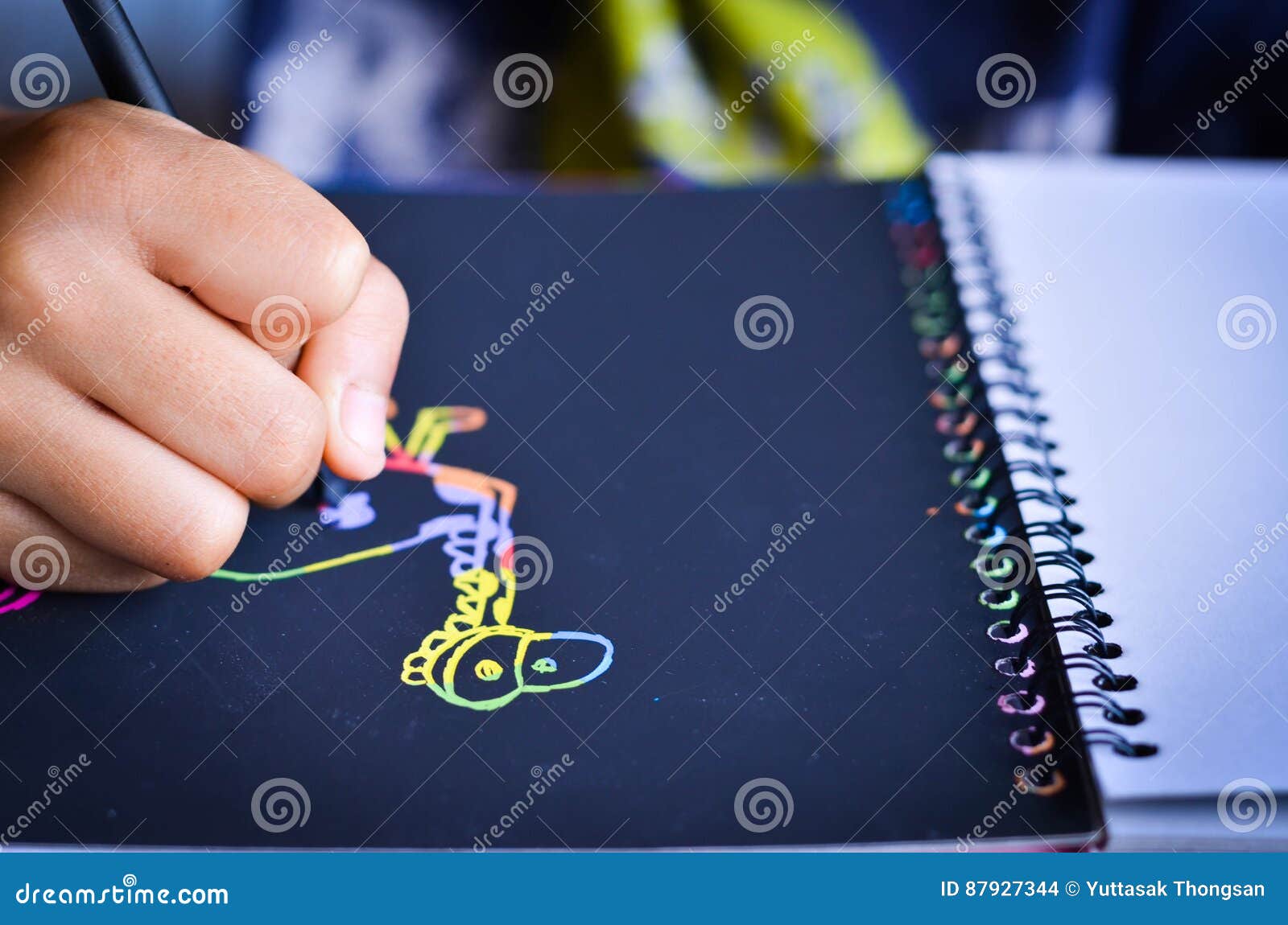 Happy Boy Draws on a Scratch Note Colorful Stock Photo - Image of ...