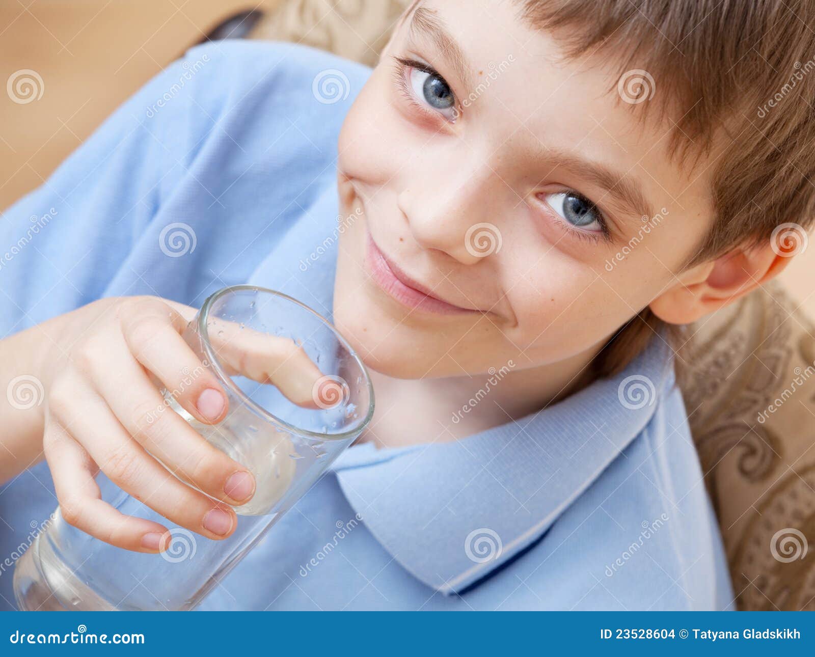 Happy boy drinking water stock photo. Image of years - 23528604