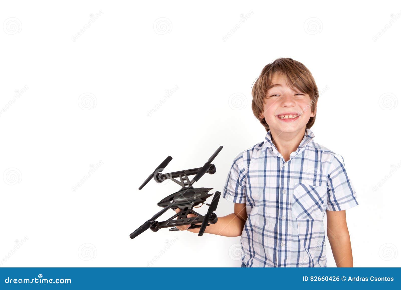 Happy boy with his drone stock photo. Image of handset - 82660426
