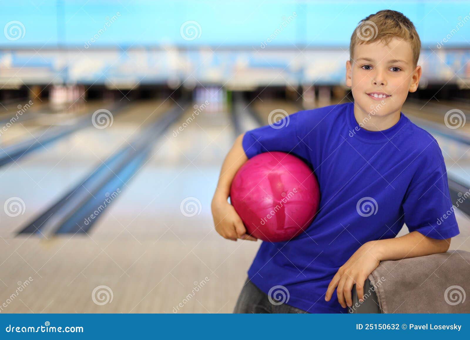 Happy Boy Holds Ball in Bowling Club Stock Photo - Image of motion ...
