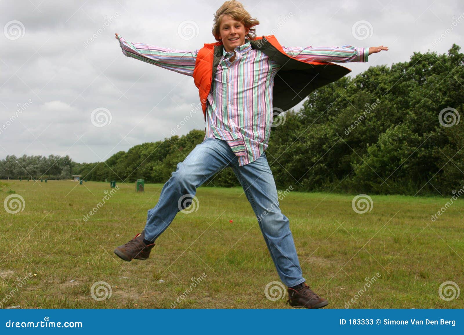 Happy boy jumping for joy stock image. Image of child, teens - 183333