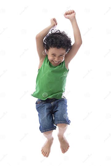 Happy Boy Jumping with Joy stock image. Image of action - 31932841