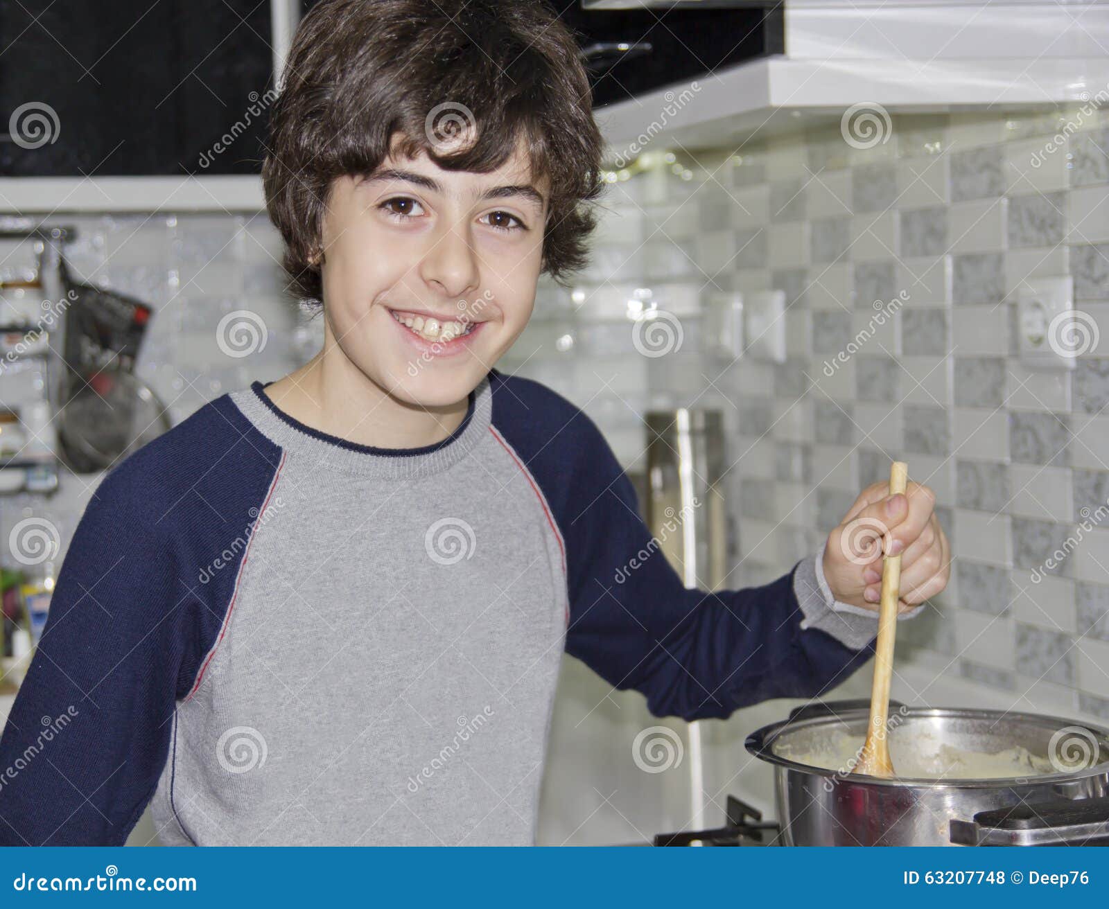 Happy Boy is in Kitchen on a Stove Cooking Soup Stock Photo - Image of ...