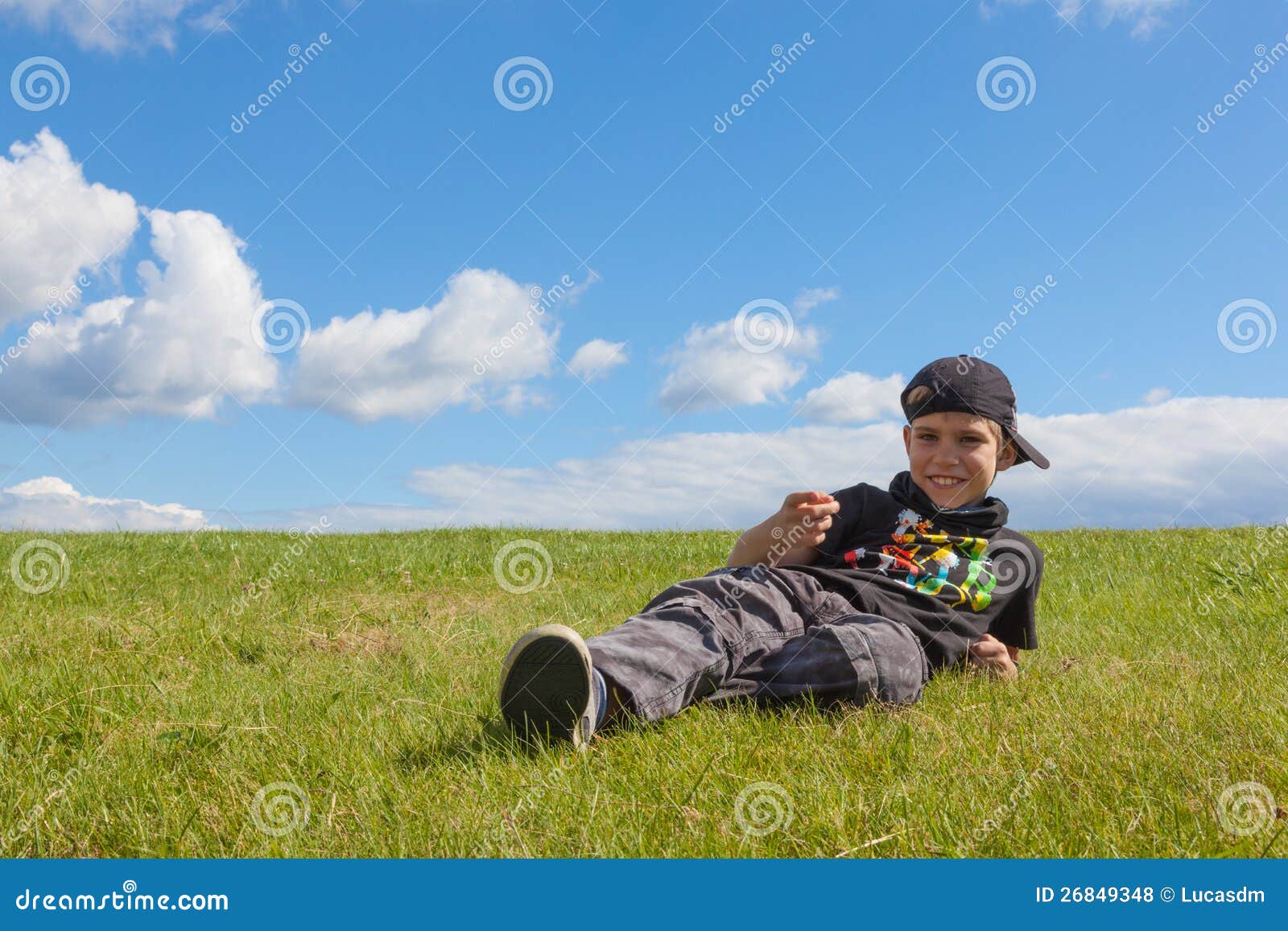 Happy Boy Lying on the Meadow Stock Photo - Image of rest, person: 26849348