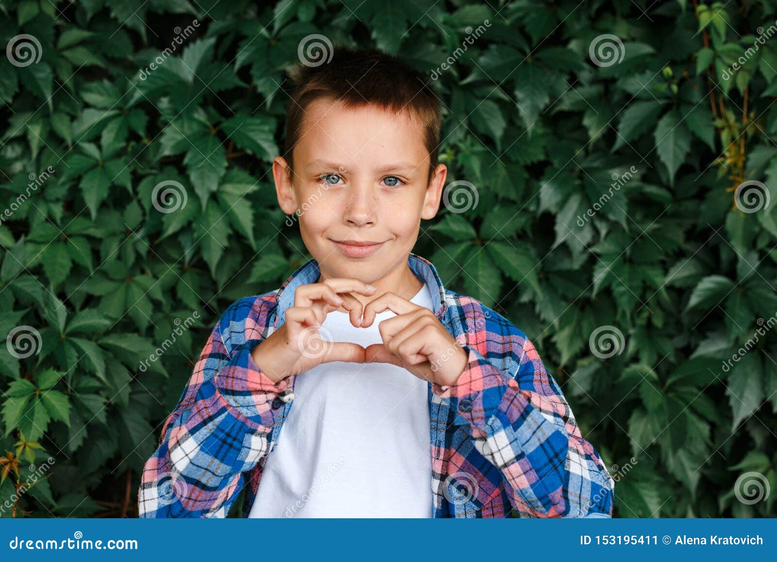 Happy Boy Making a Heart Shape with His Hands Stock Image - Image of ...