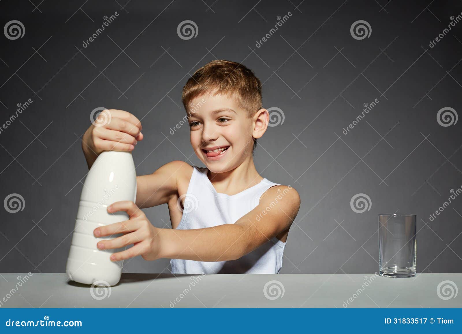 Happy Boy Opening Bottle of Milk Stock Image - Image of person, boys ...