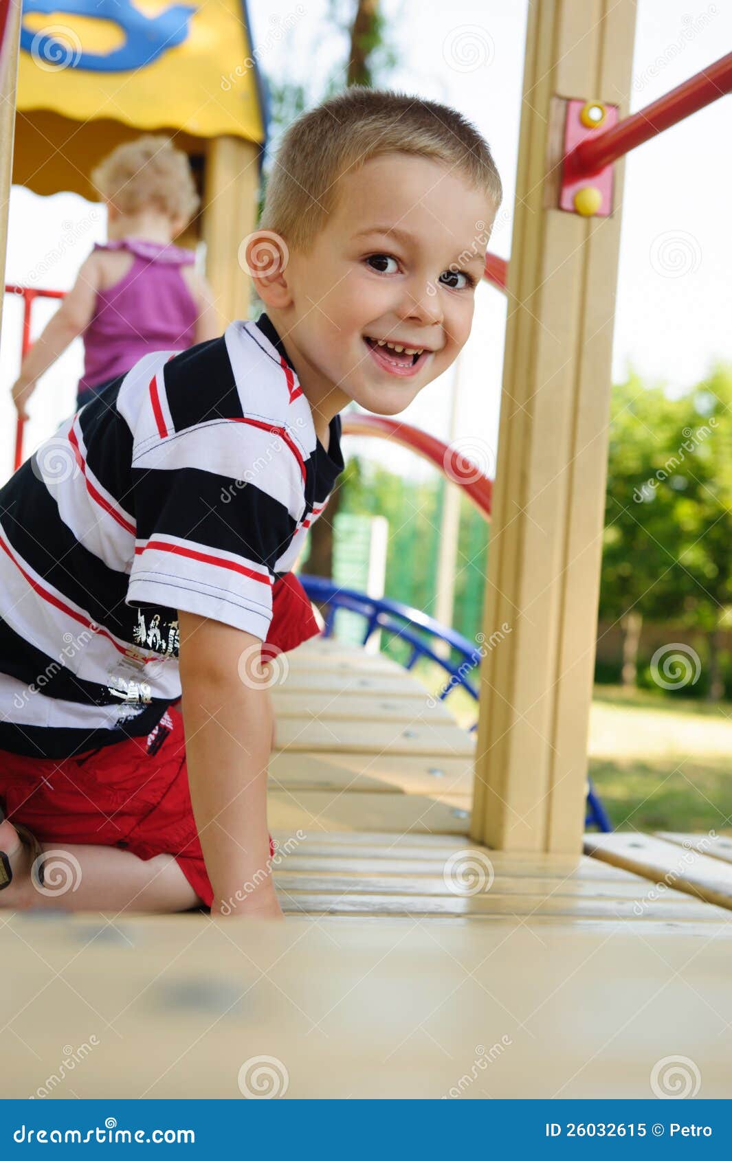 Happy boy at playground stock image. Image of childhood - 26032615