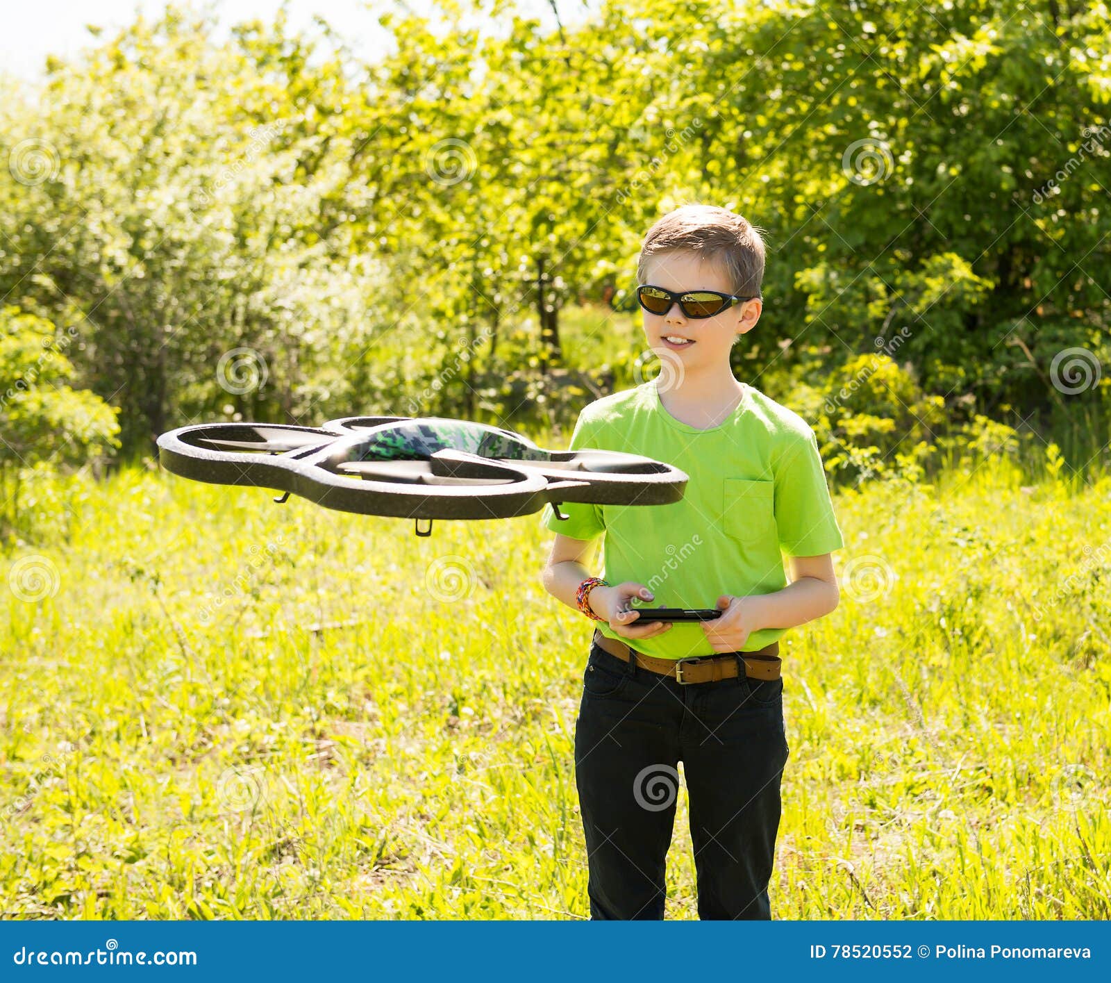 Happy Boy Playing with Flying Drone with Camera Controlled by Sm Stock ...